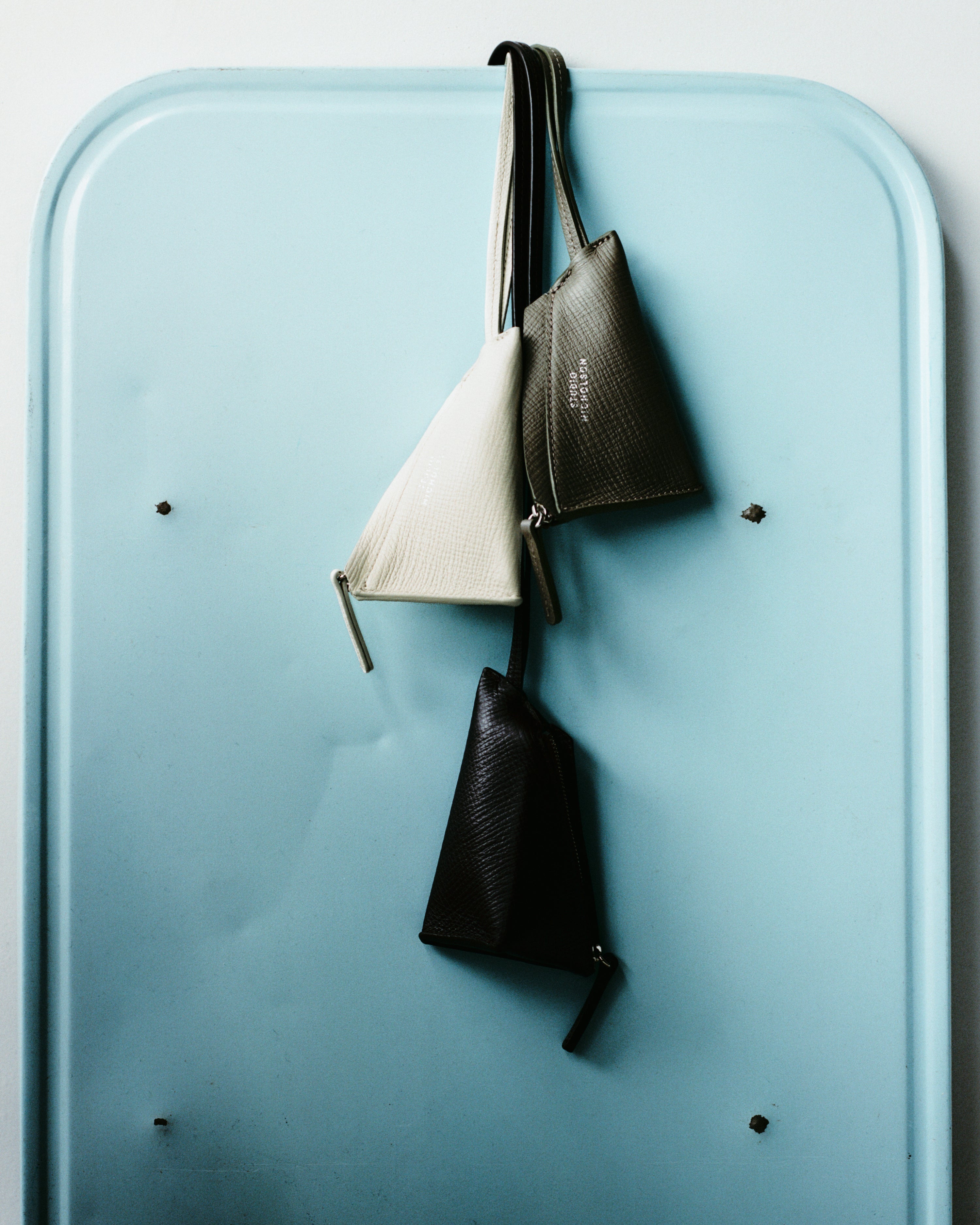 Studio Nicholson welcomes two new small leather styles to the leather ...